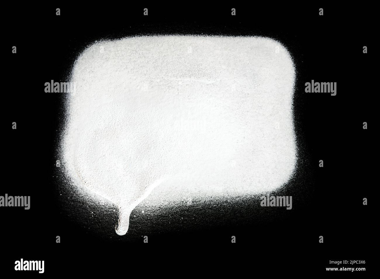 Close-up of a white spray paint rectangle shape with splashes and drip ...