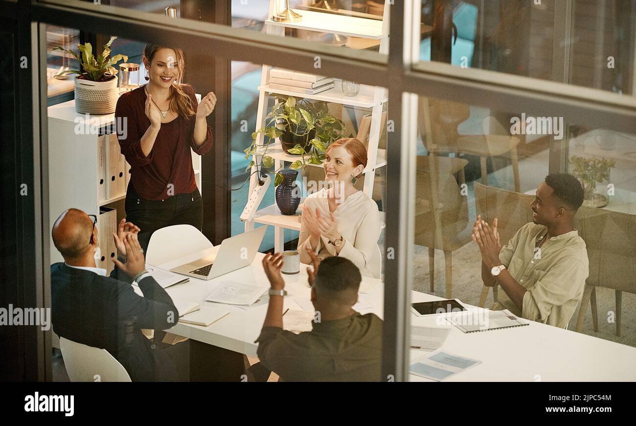Successful team clapping hands, cheering during deal or meeting in ...