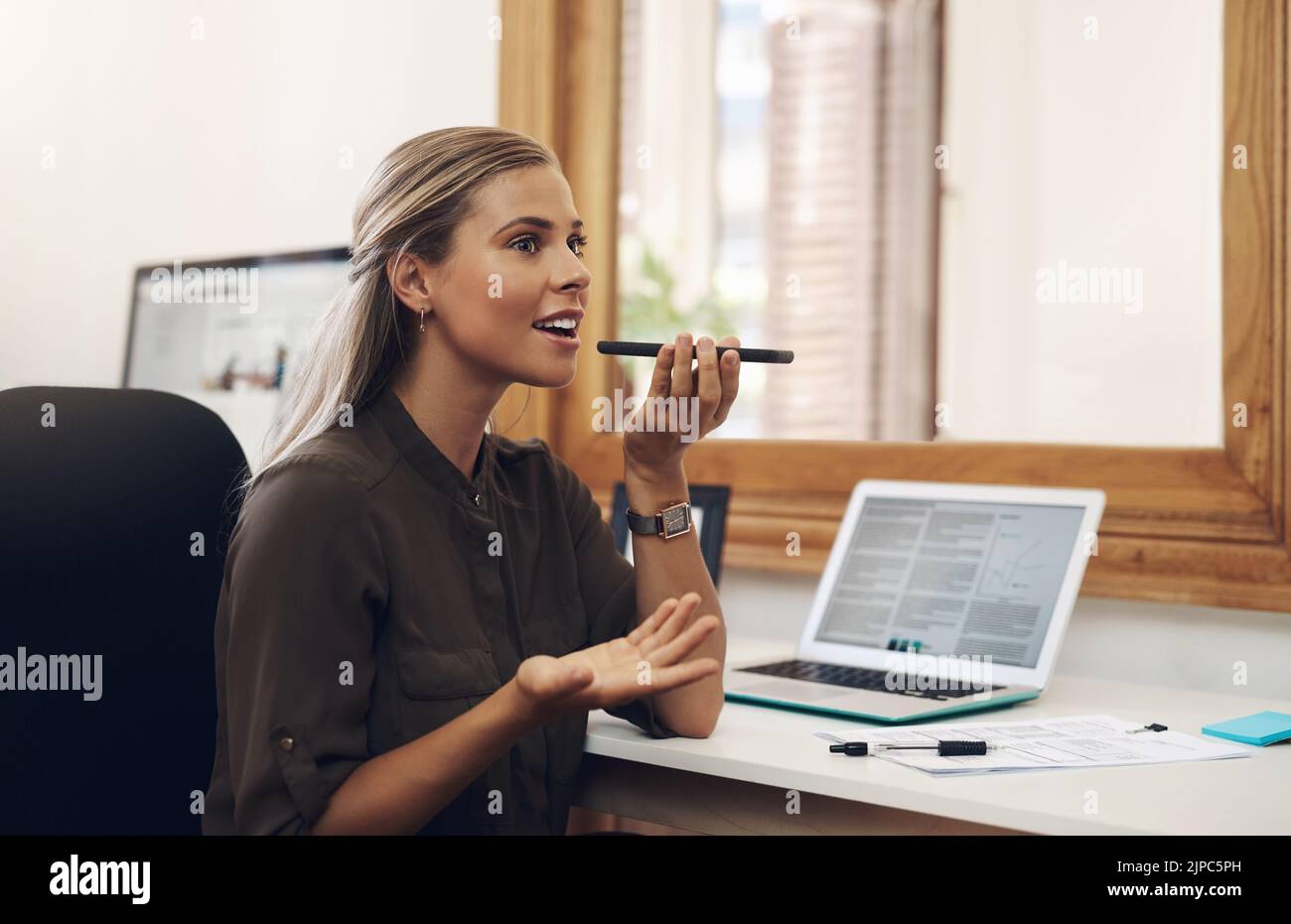 Female professional sending voicemail hi-res stock photography and ...