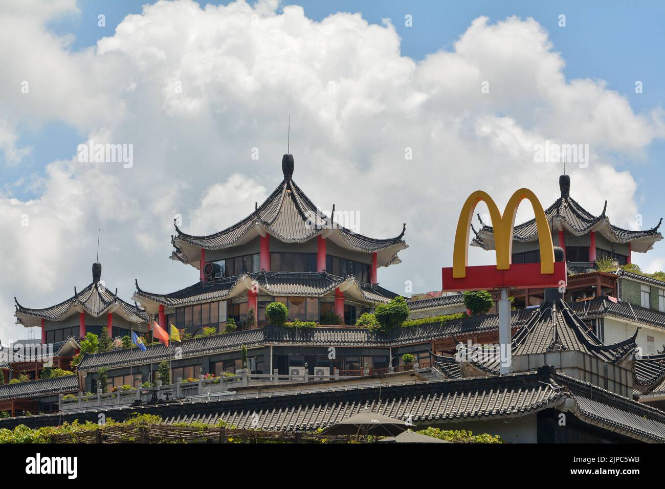 The big yellow arches of McDonald's on the top of a traditional pagoda ...