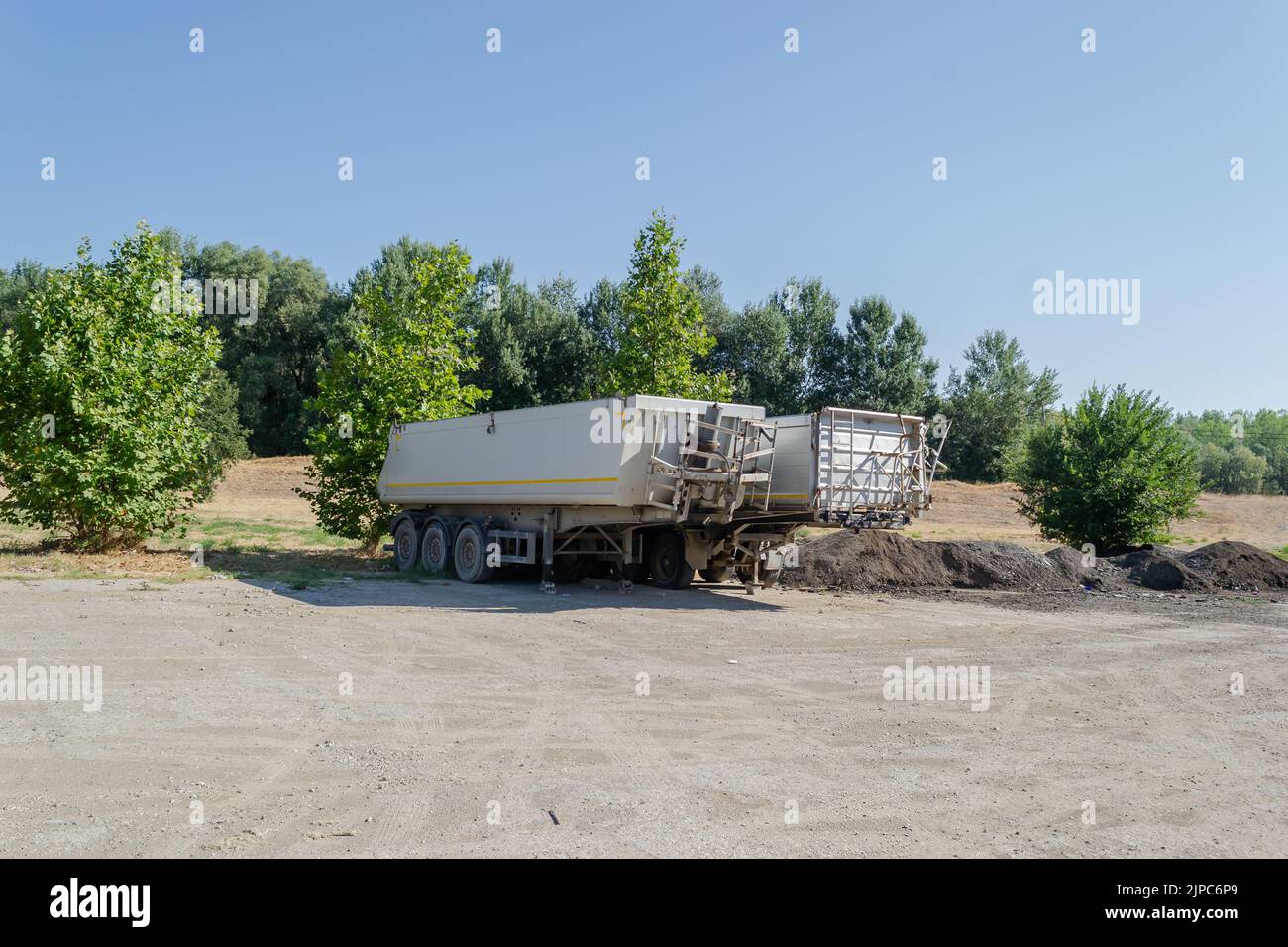 Parked truck trailers. Truck trailers parked in a nearby parking area ...