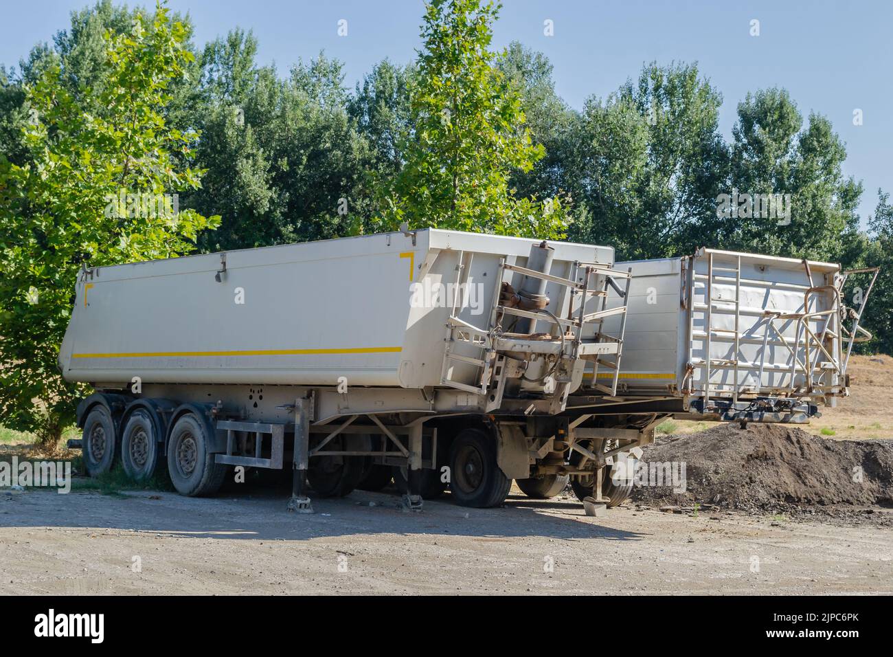 Parked truck trailers. Truck trailers parked in a nearby parking area ...