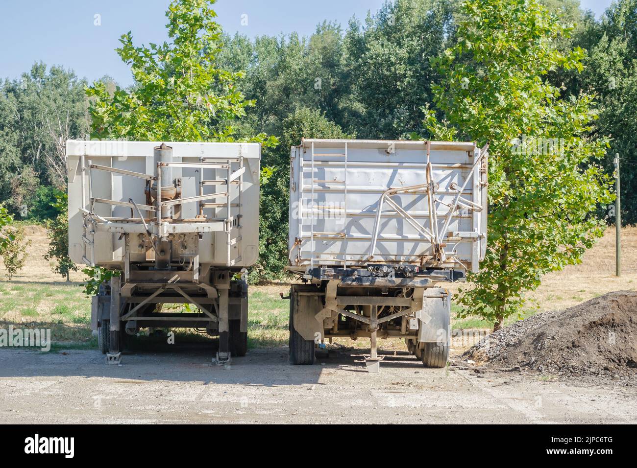 Parked truck trailers. Truck trailers parked in a nearby parking area ...