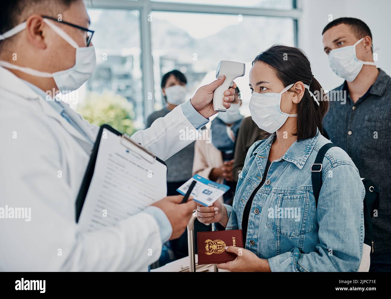Travel restriction, covid pandemic and temperature check at airport ...