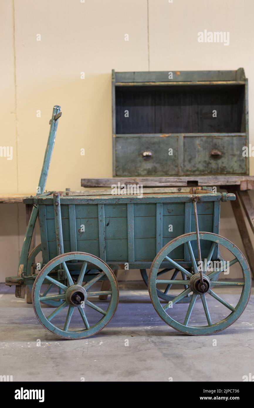Antique Wooden Blue Wheel Cart Stock Photo - Alamy