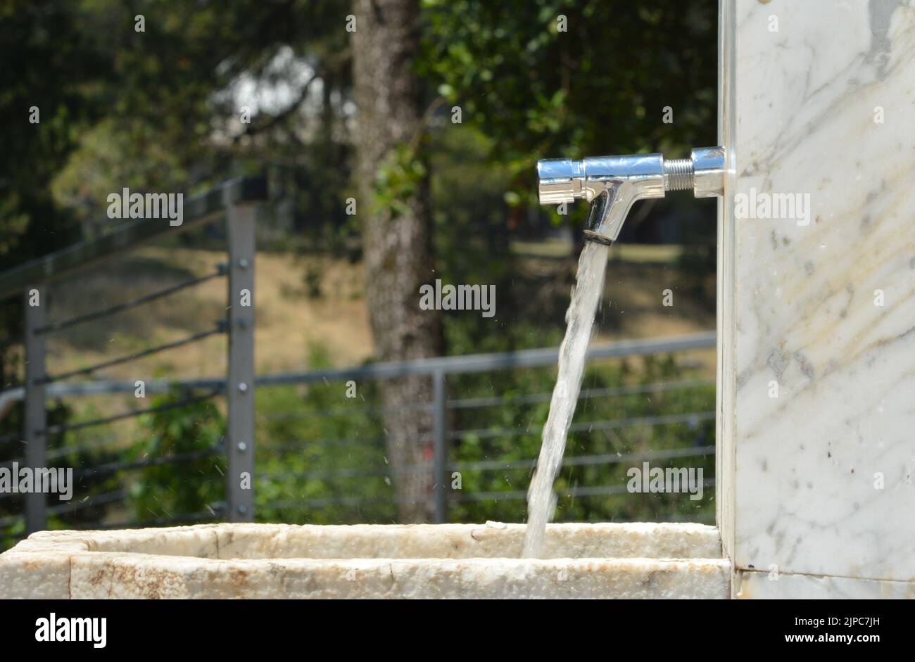 a public drinking water faucet in public park Stock Photo - Alamy