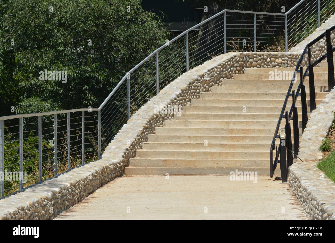 concrete stairs with metal handrails in public park Stock Photo - Alamy