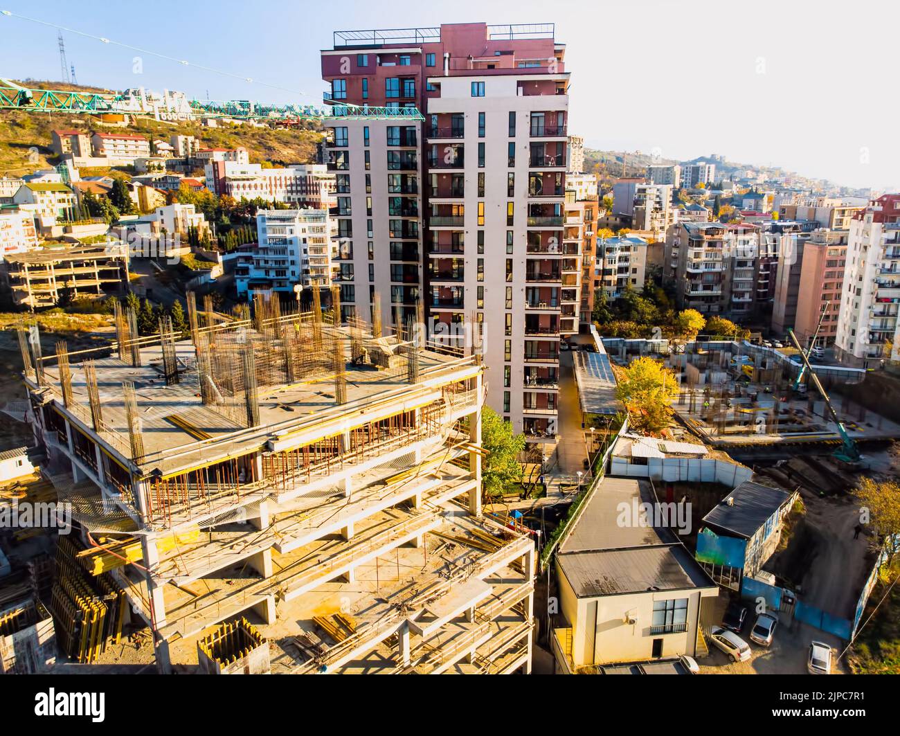 Aerial view real estate construction site with workers and panoramic ...