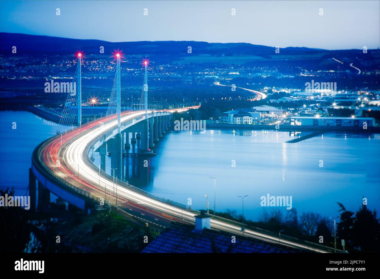 An aerial view of traffic light trails over Kessock Bridge in Inverness ...