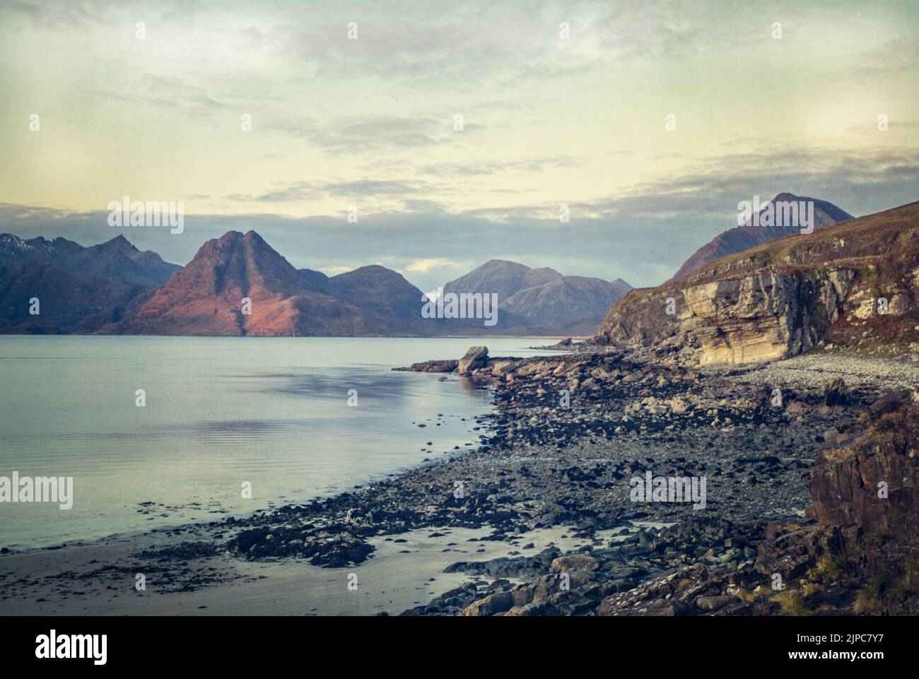 The beach at Elgol on the Isle of Skye at sunset in the Scottish ...