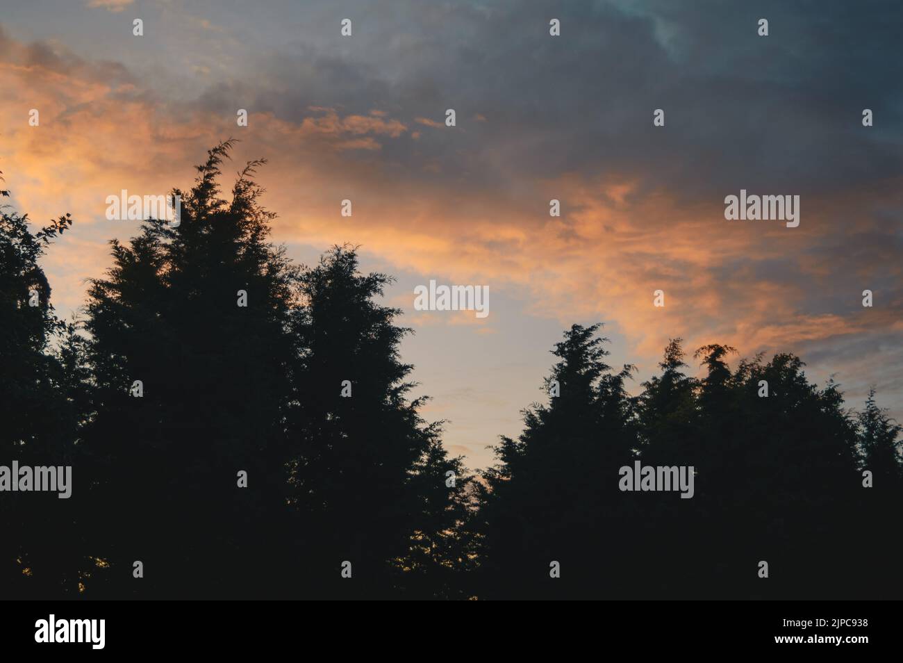 When the sun start to light the clouds with a orange color and some ...