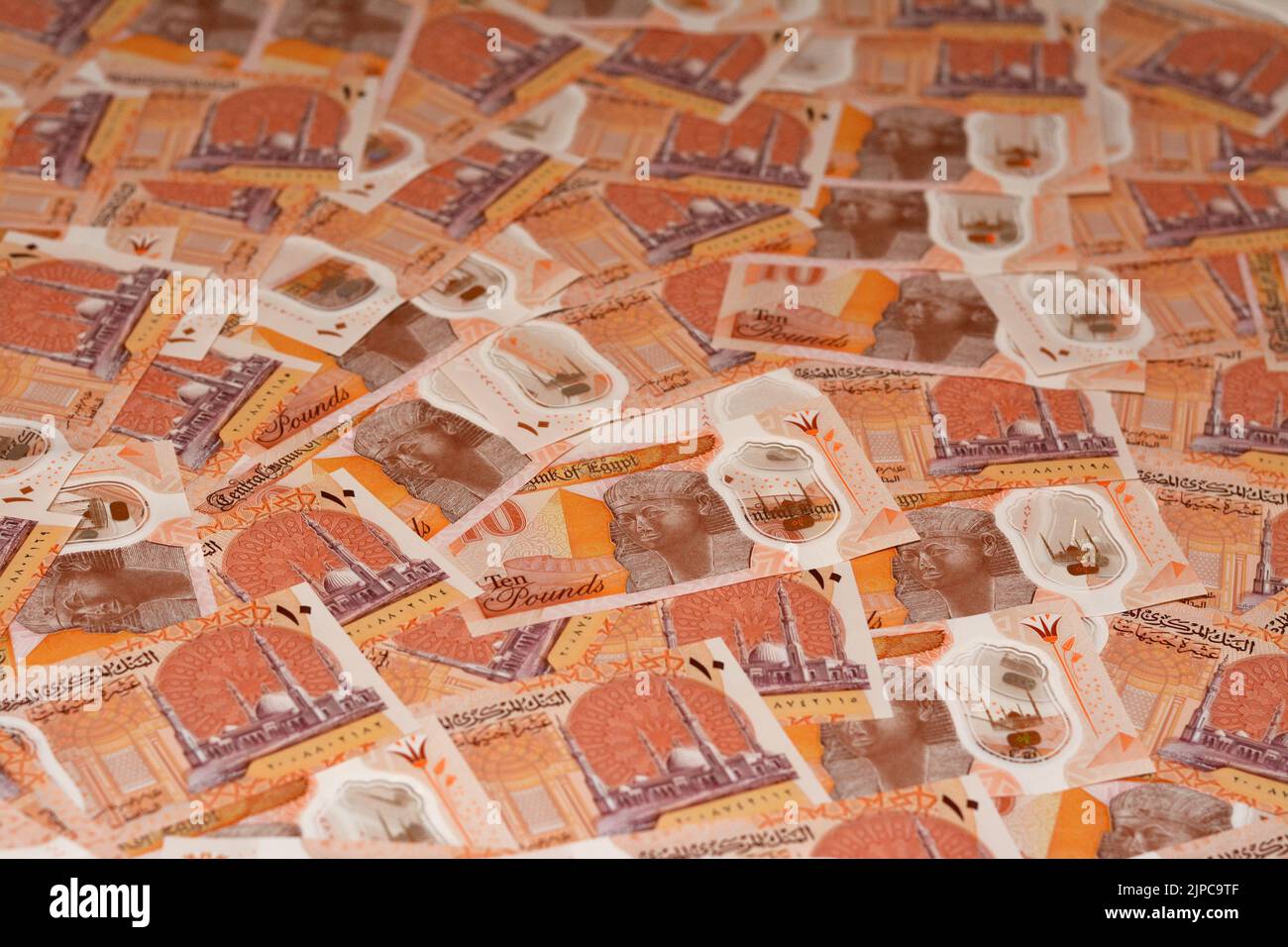 Pile of the new first Egyptian 10 LE EGP ten pounds plastic polymer ...
