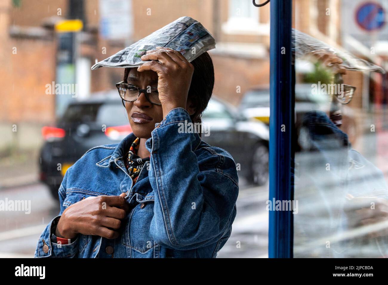 Makeshift rain cover Wet weather finally in London after rough ...
