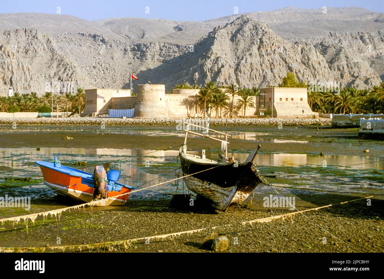 Boats beached near the old Portuguese fort in Khasab, Musandam ...