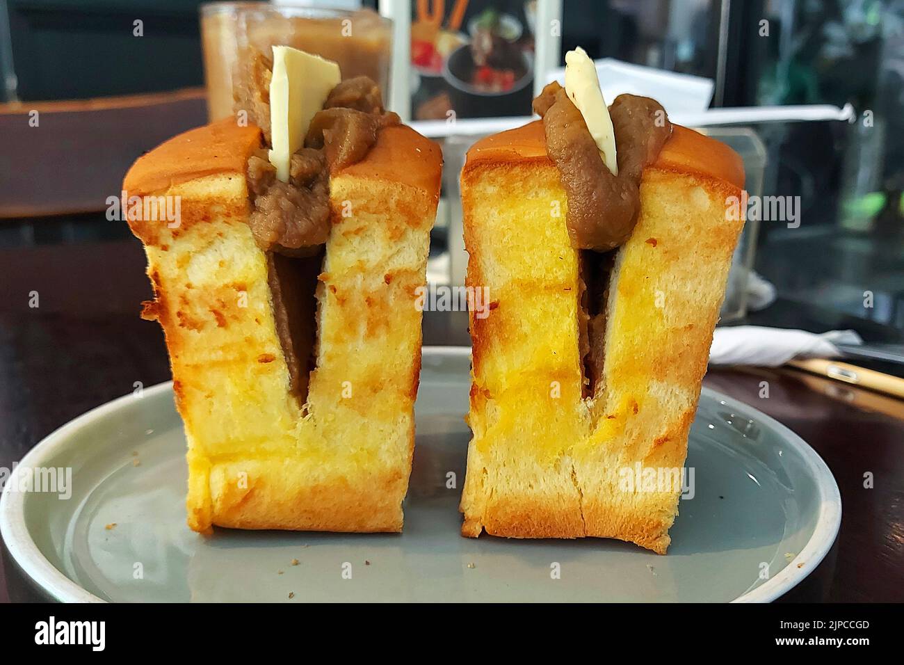 Bread Toast at Malacca Toast Cafe, Jakarta, Indonesia Stock Photo - Alamy