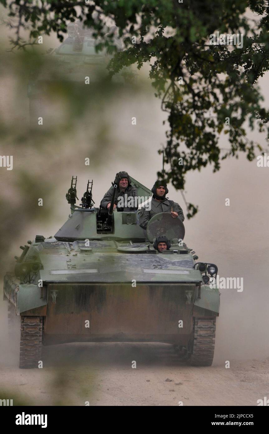 Serbian Army main battle tank M84 (version of Soviet T-72) and M80 armored personal carrier (APC ...
