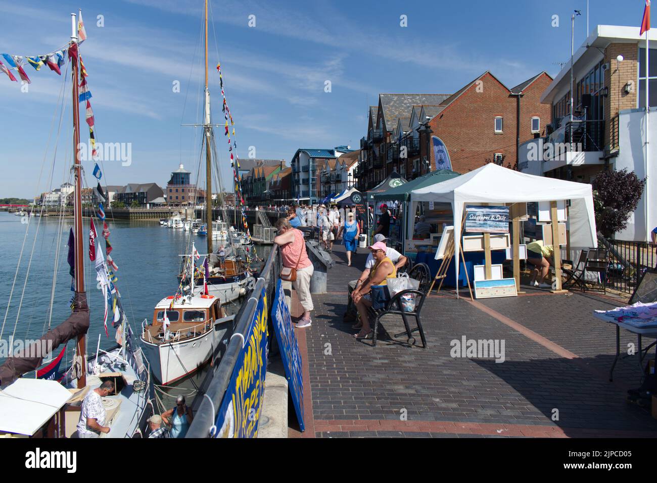 A busy riverside on the River Arun with stand which are popular with ...