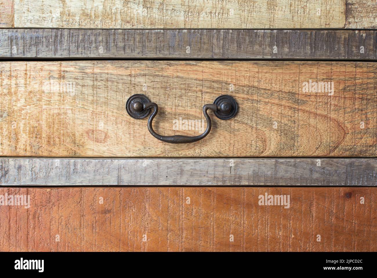 Old-fashioned wooden drawer handle Stock Photo - Alamy