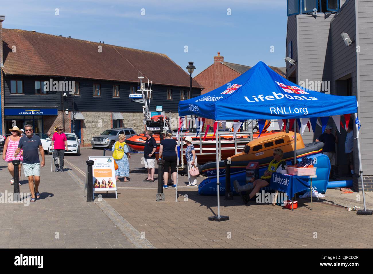 RNLI stand in front of the RNLI Lifeboat building during the ...