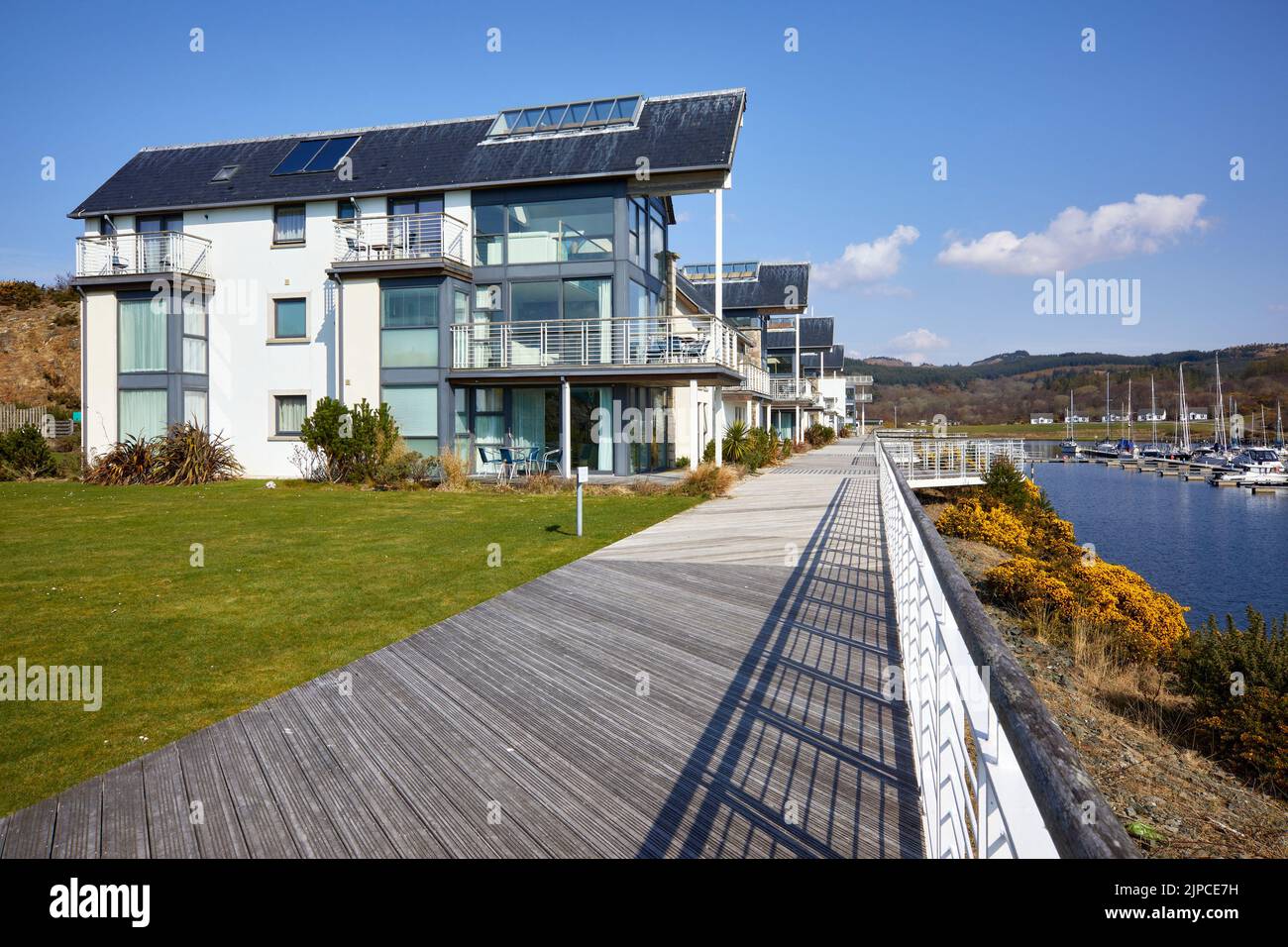 Overlooking the harbour, the accommodation development on a bright and ...