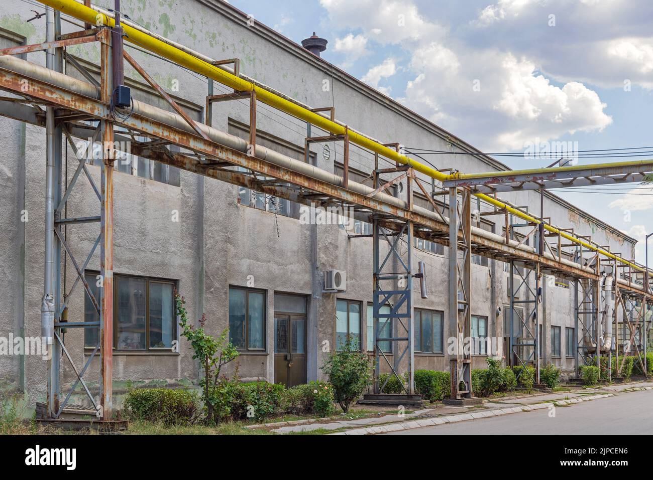 Yellow Gas Pipe and Silver Heating Pipeline at Rust Industry Factory ...
