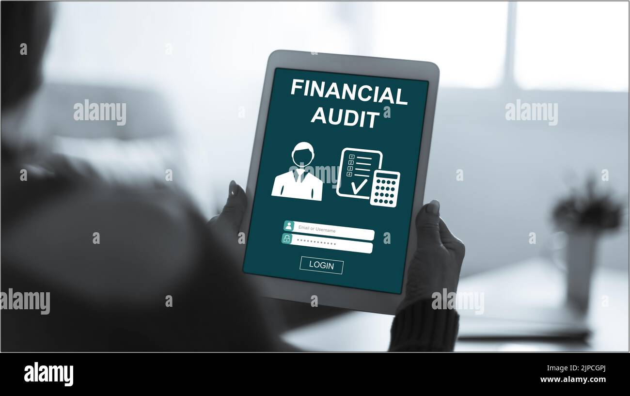 Tablet screen displaying a financial audit concept Stock Photo - Alamy