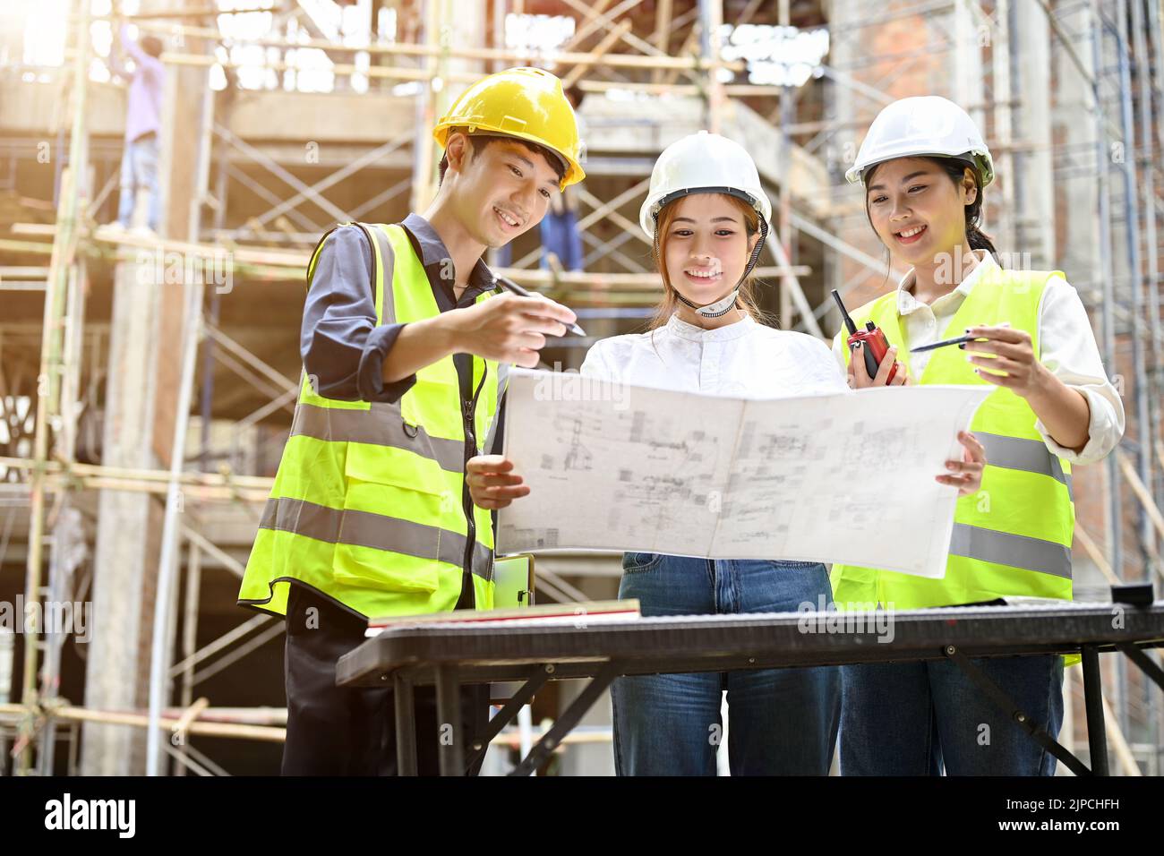 A team of professional young asian engineer working together at the ...