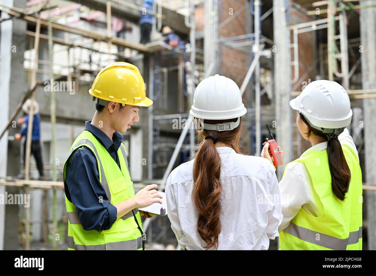 A group of civil engineer or architect talking about their plan in ...