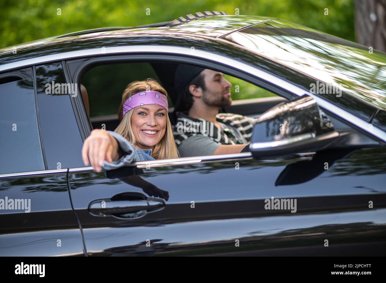 Couple flirting in car hi-res stock photography and images - Alamy