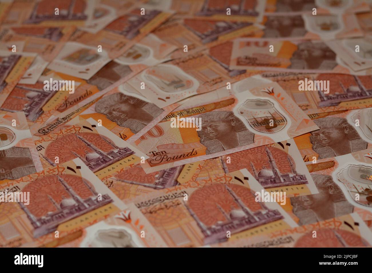 Pile of the new first Egyptian 10 LE EGP ten pounds plastic polymer ...