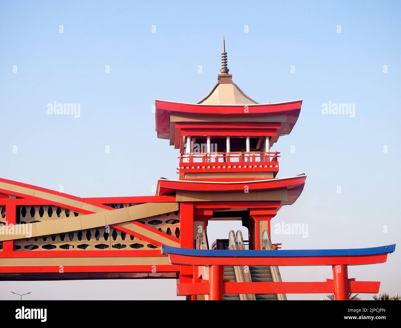 A pedestrian bridge finished in traditional Japanese architectural ...