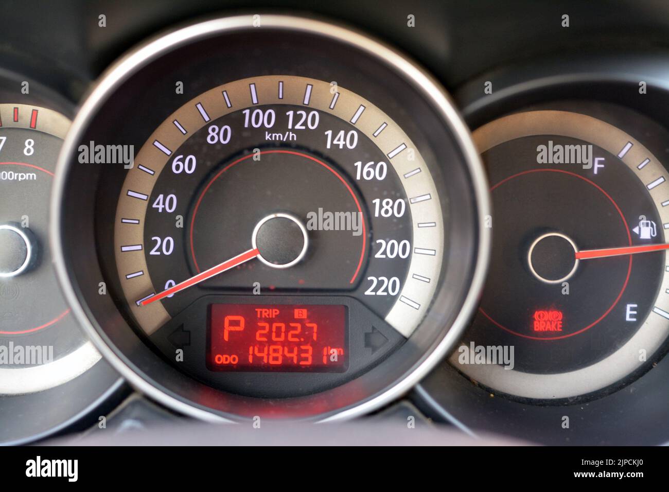 selective focus of a car dashboard details set of a parking vehicle and ...