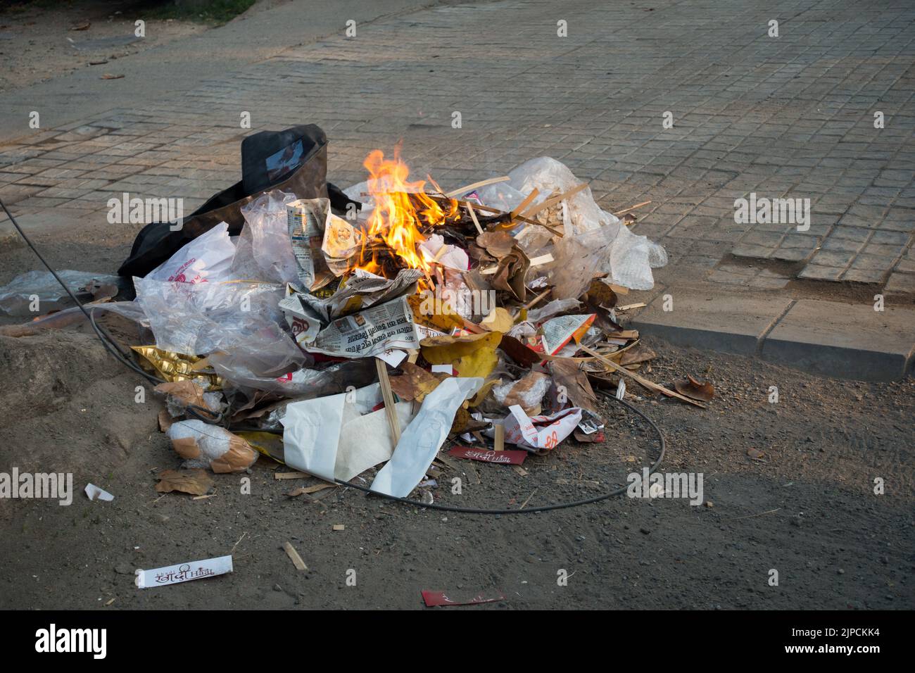 February 21st 2021 Dehradun India. Burning pile of garbage full of ...
