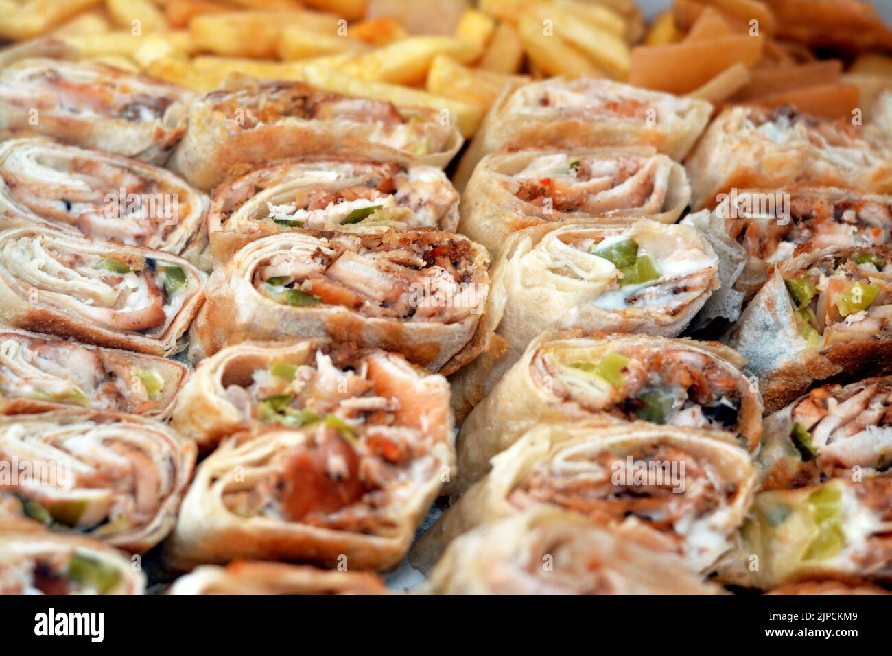 Syrian recipe cuisine background, a box full of pieces of chicken ...