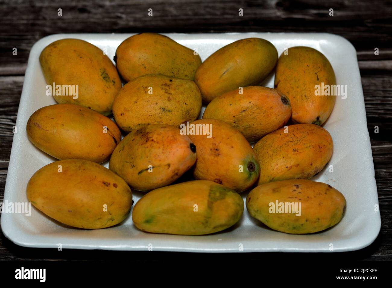 plate of Egyptian fresh mango fruit with tropical delicacy, mangoes are ...