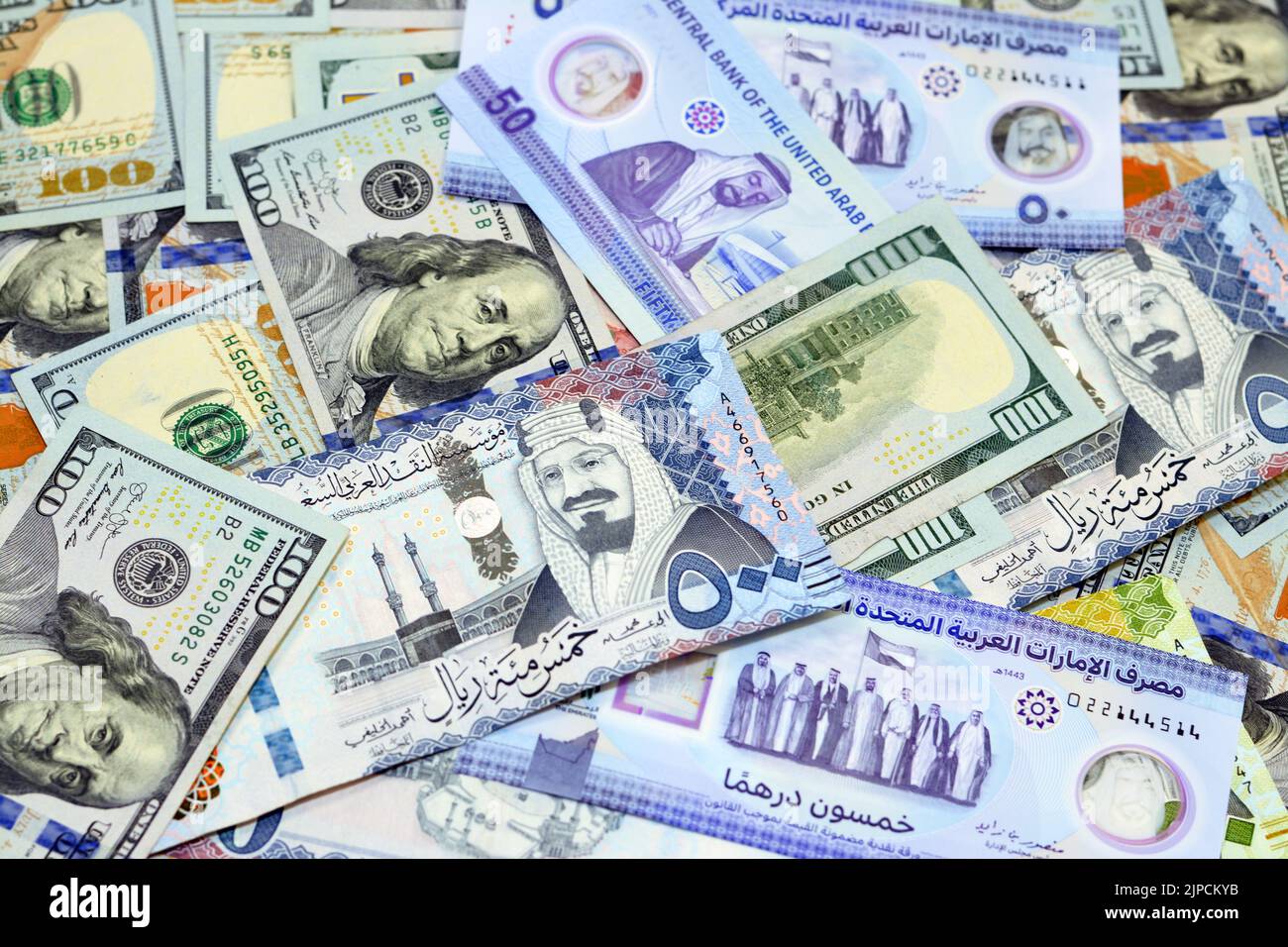 Pile Of American Dollar Bills American Cash Money Banknotes With Saudi Pile Of American Dollar Bills American Cash Money Banknotes With Saudi