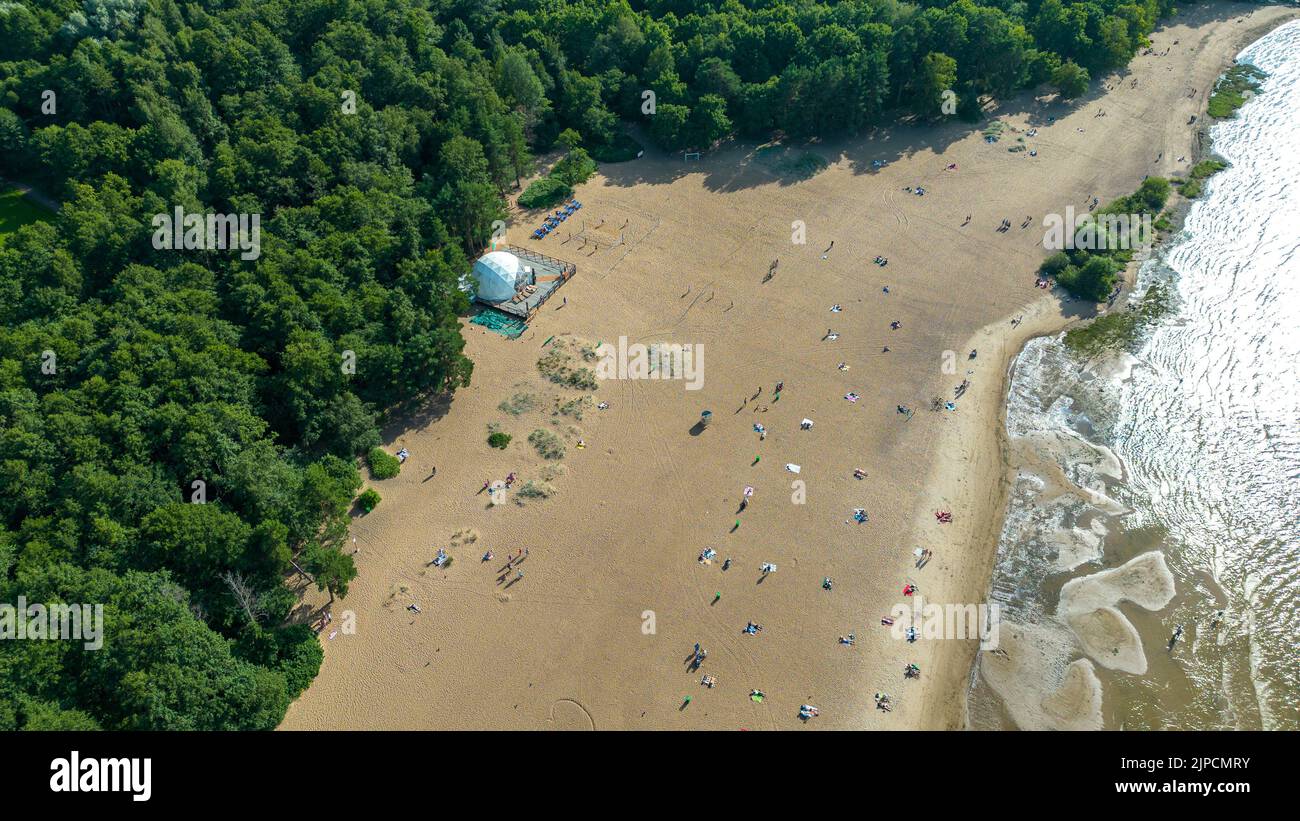Drone view of the beach and people resting Stock Photo - Alamy