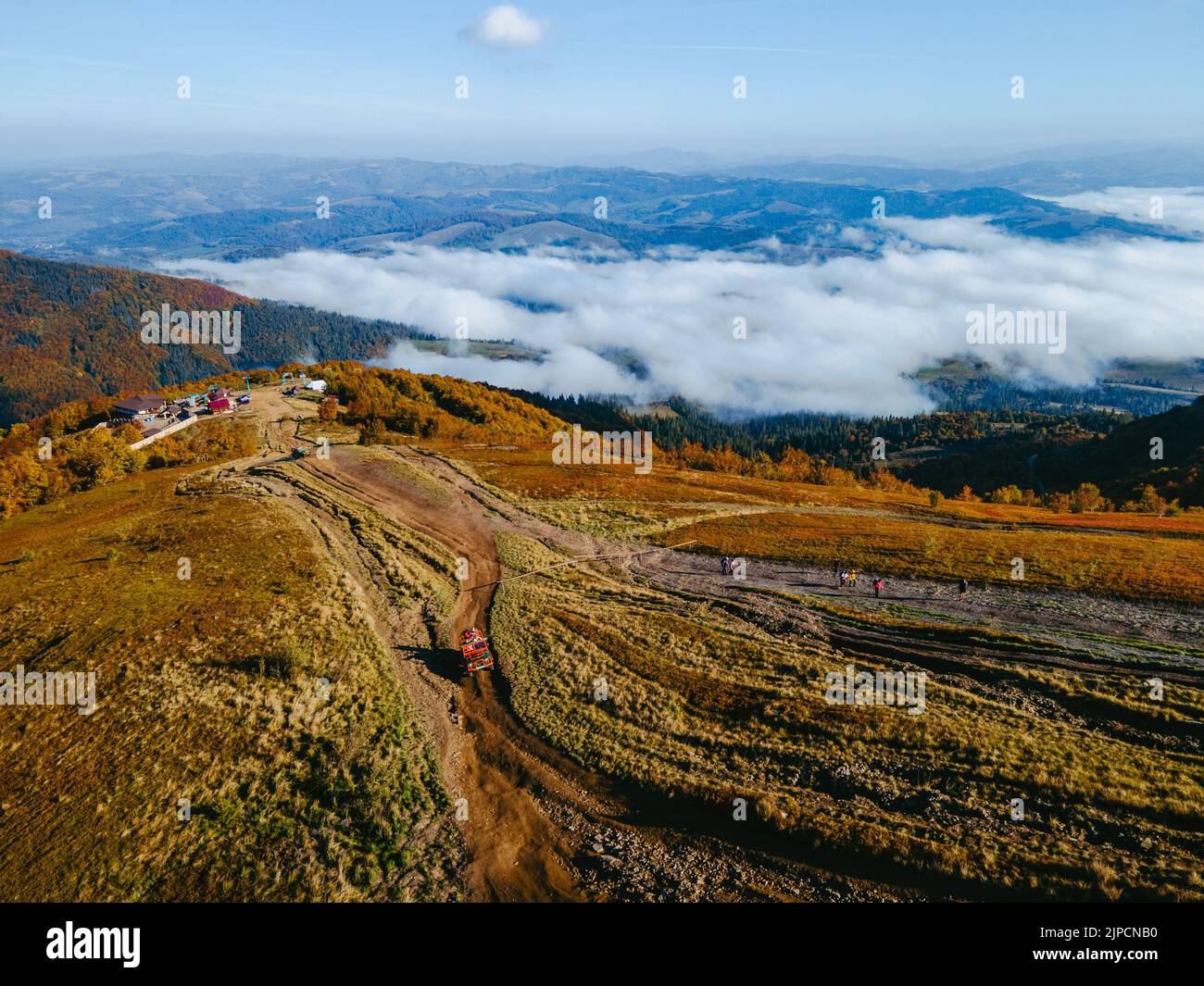 aerial view of suv off road travel climbing up by mountain hill Stock ...