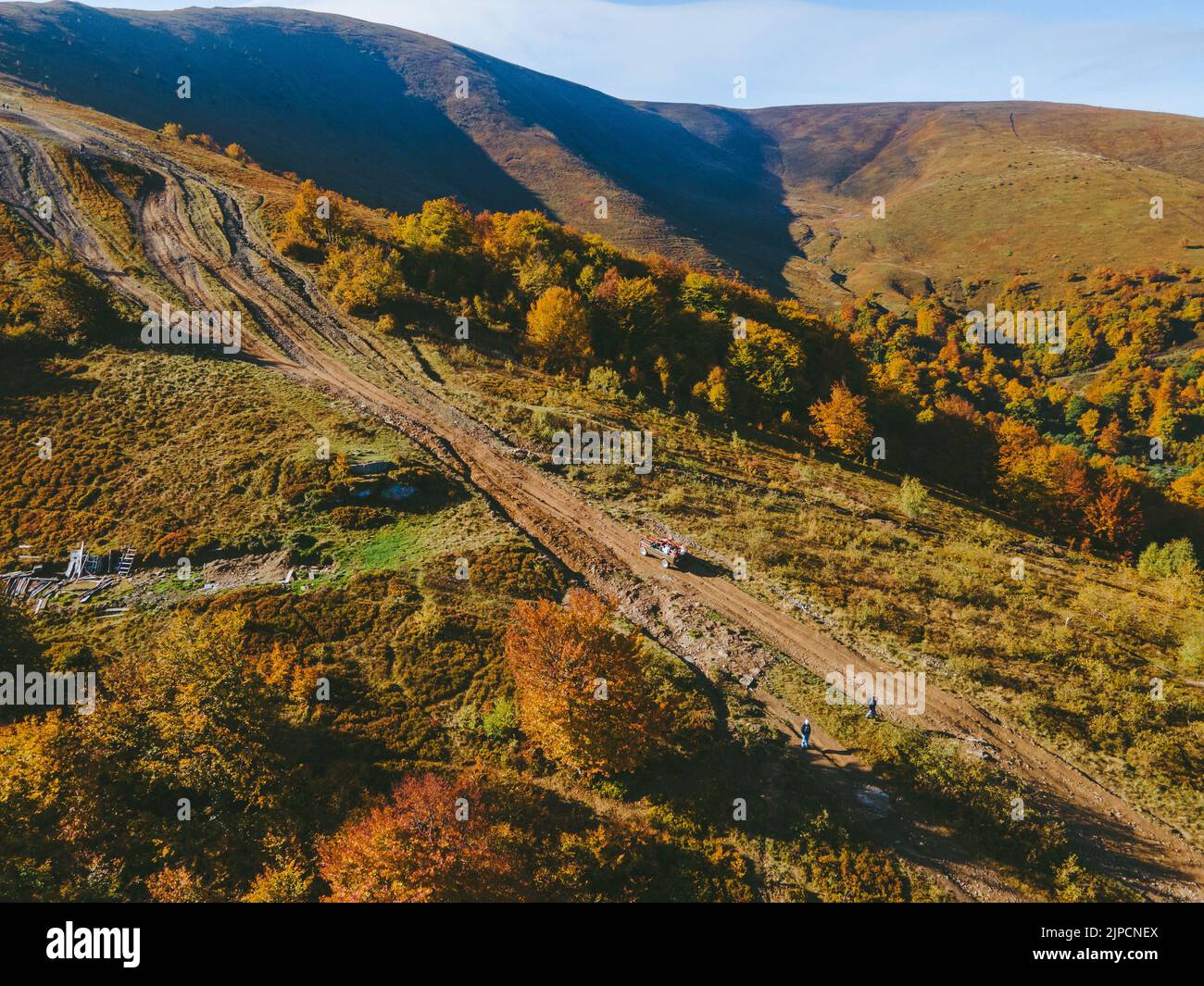 aerial view of suv off road travel climbing up by mountain hill Stock ...