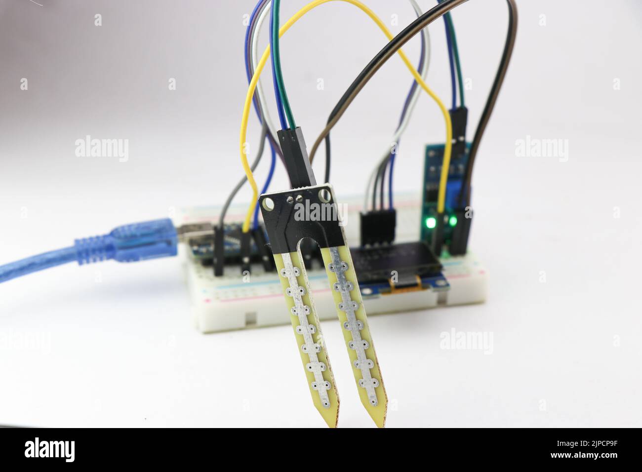 Soil moisture sensor with some breadboard circuit using a programmable ... Soil moisture sensor with some breadboard circuit using a programmable ...