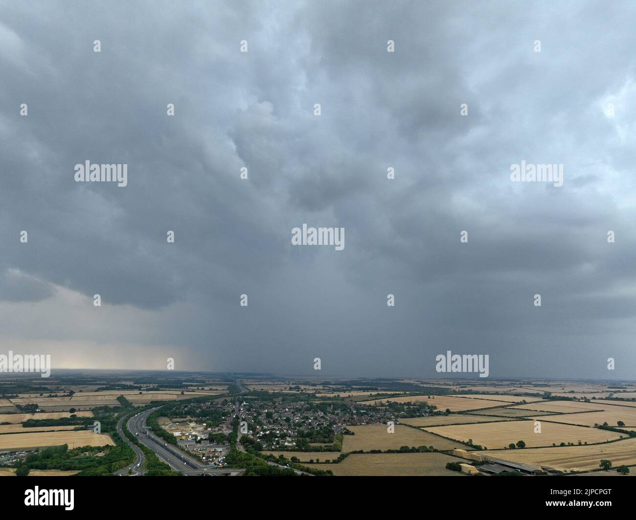 Peterborough, UK. 16th Aug, 2022. Dark rain clouds finally start to ...
