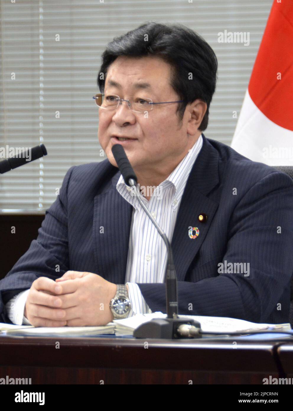 New Japanese Environment Minister Akihiro Nishimura gives an interview ...