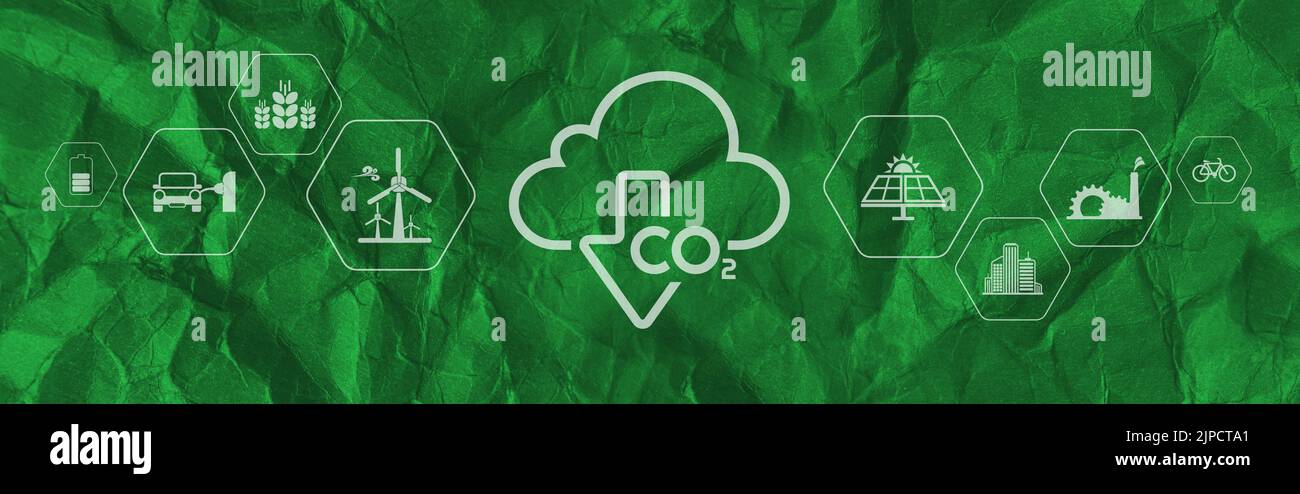 reducing CO2 emissions to stop climate change. green energy background ...