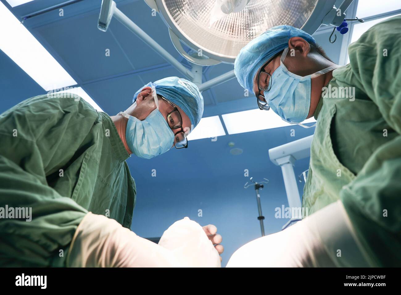 LIANYUNGANG, CHINA - AUGUST 17, 2022 - A doctor operates on a patient ...