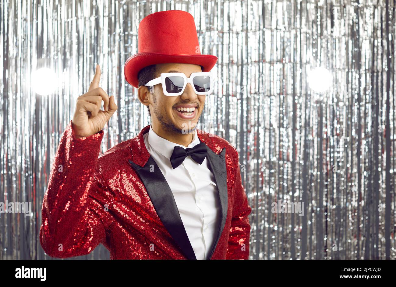 Happy African American man in disco jacket Stock Photo - Alamy