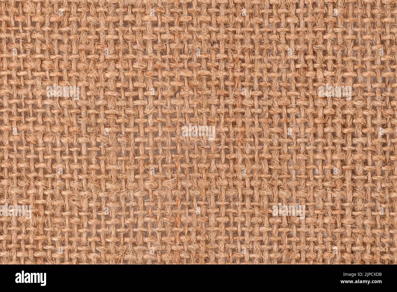 Jute bast fiber fabric background Stock Photo - Alamy
