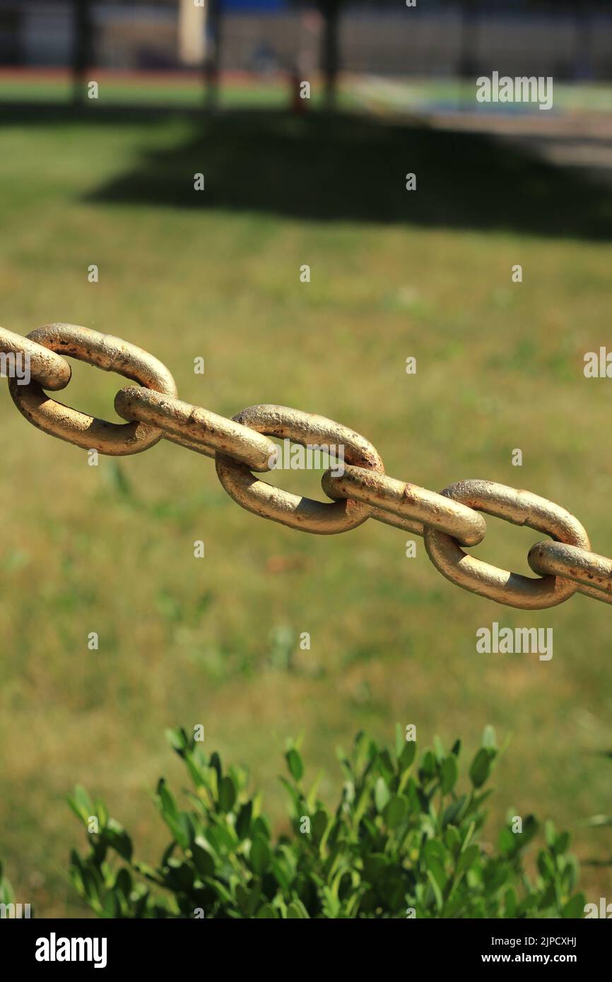 A taught rope of iron metal chain links with lots of holding power ...