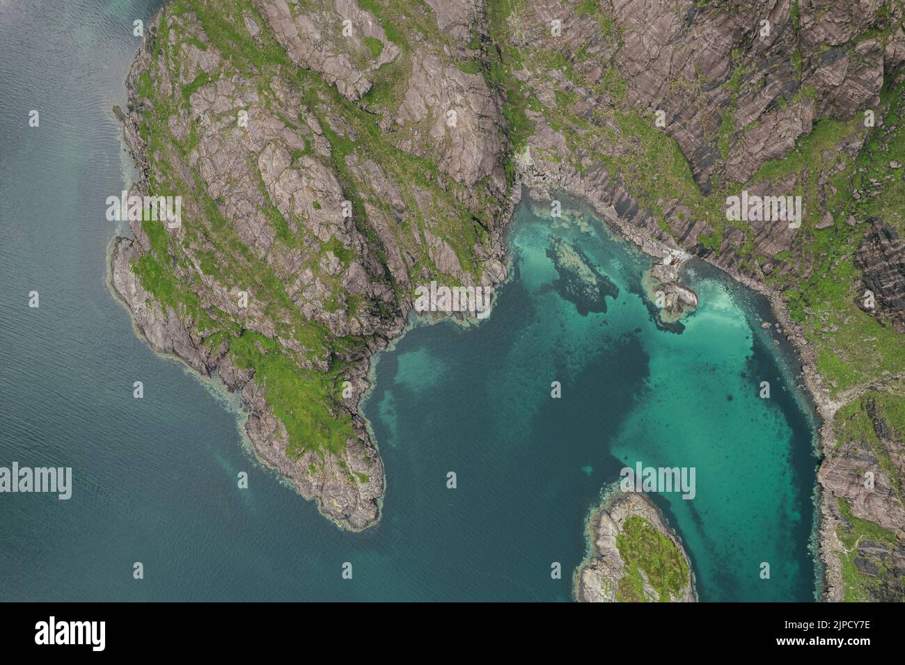 A beautiful aerial view of Loch Coruisk with rocks at the seashore ...