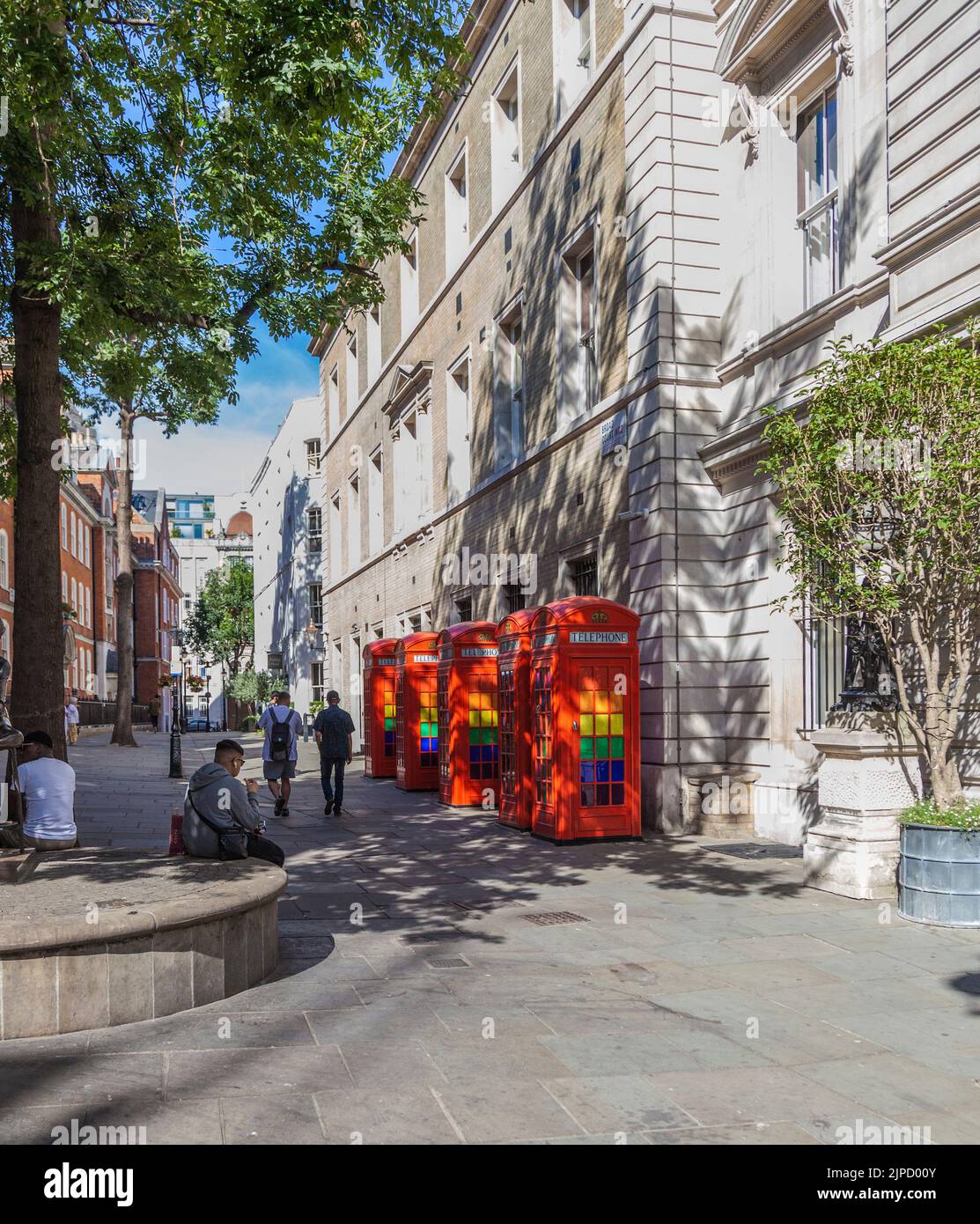 Red telephone boxes in Londons West End decorated in Gay Pride colours ...