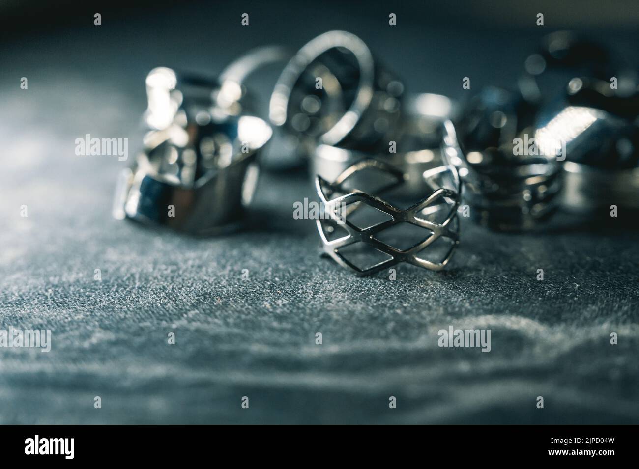 A closeup shot of a pile of vintage silver decorative rings Stock Photo ...